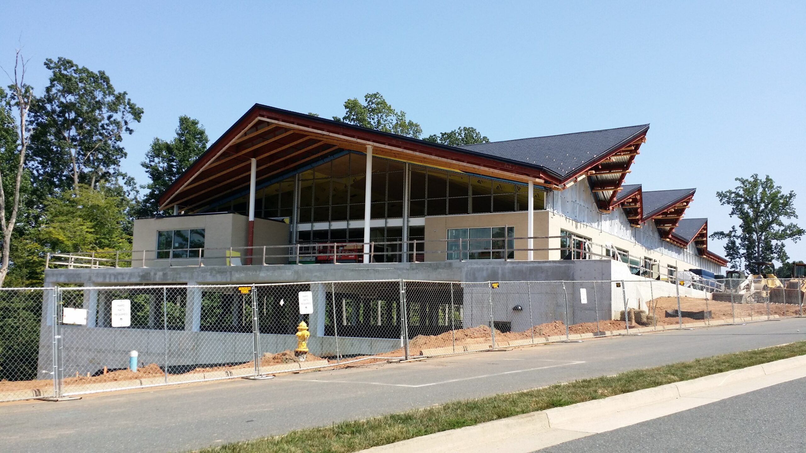 Montclair Library rising behind shopping center - Potomac Local News