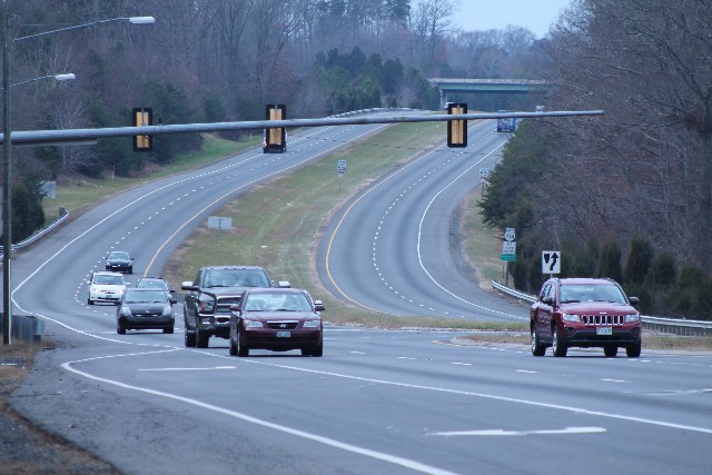 How a displaced left-turn intersection and others could improve traffic ...