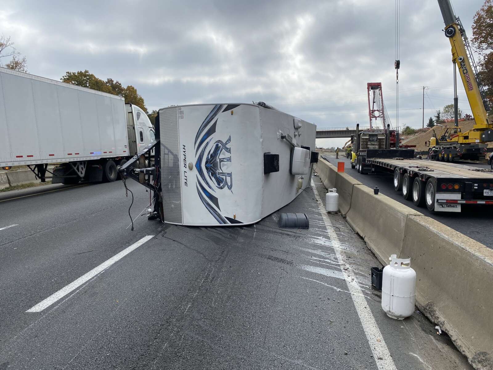 Tractor trailer, RV overturn on area highways, traffic snarled